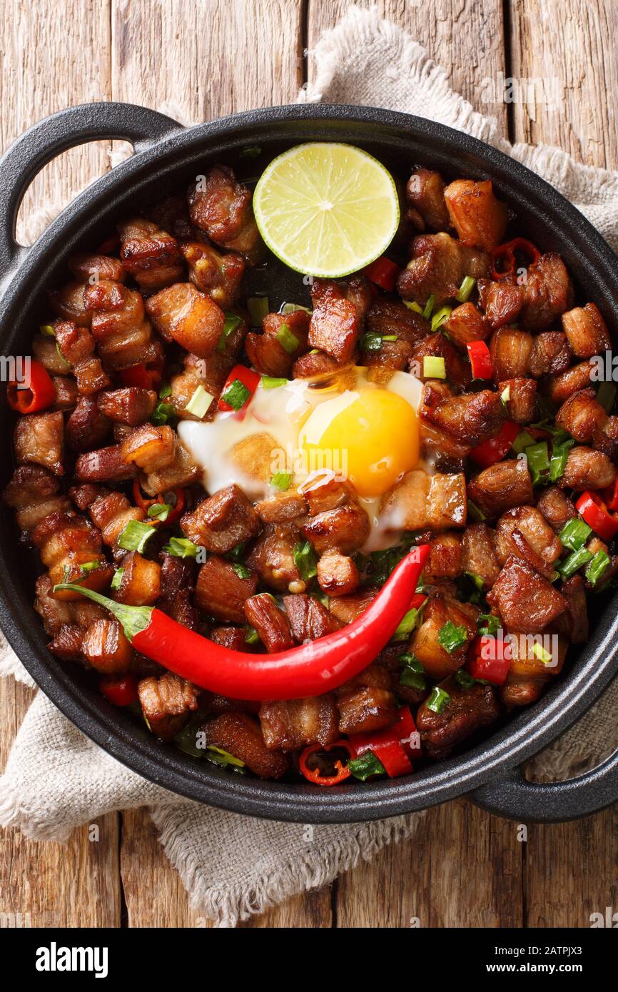 Sisig is a Kapampangan dish made from parts of pig’s head and liver ...