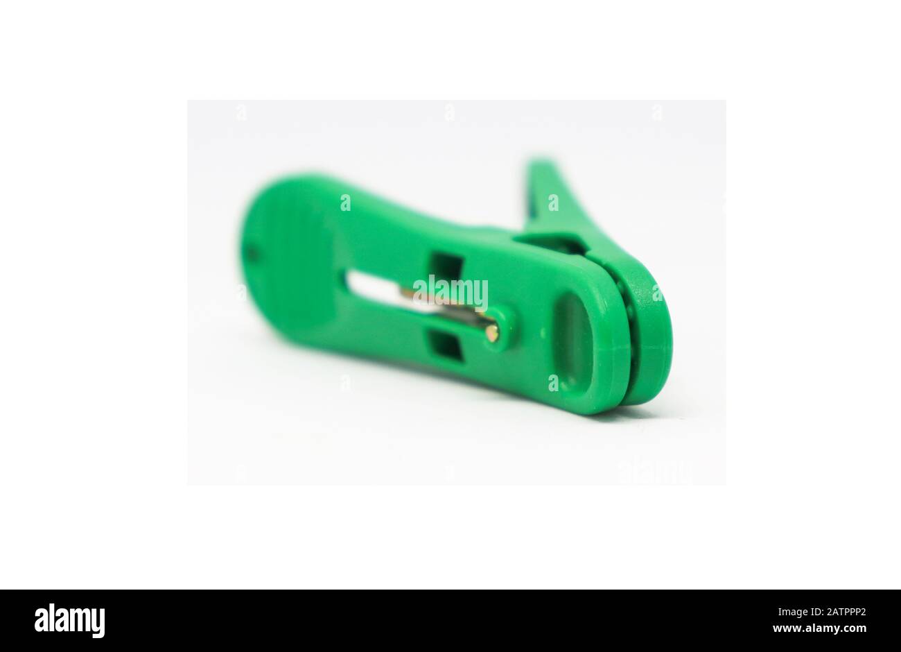 Green plastic clothespin isolated on white background. Plastic clips ...