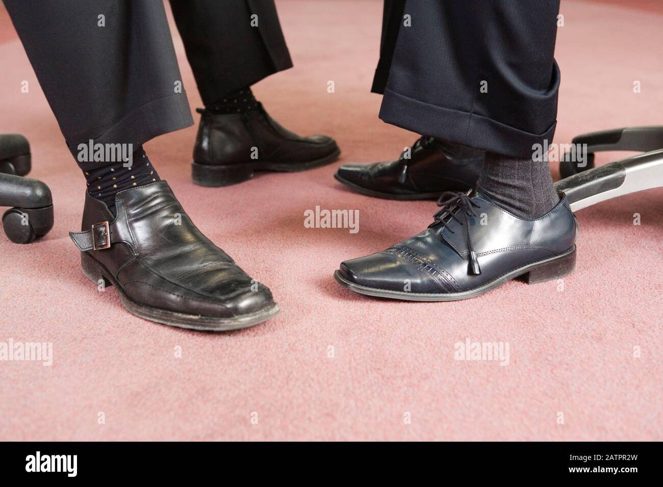 African men sitting in shoe hi-res stock photography and images - Alamy