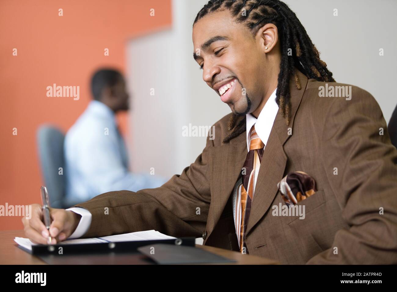 A Business man working in an office Stock Photo - Alamy