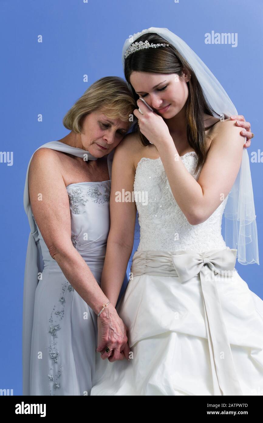 View of mother and daughter crying Stock Photo - Alamy