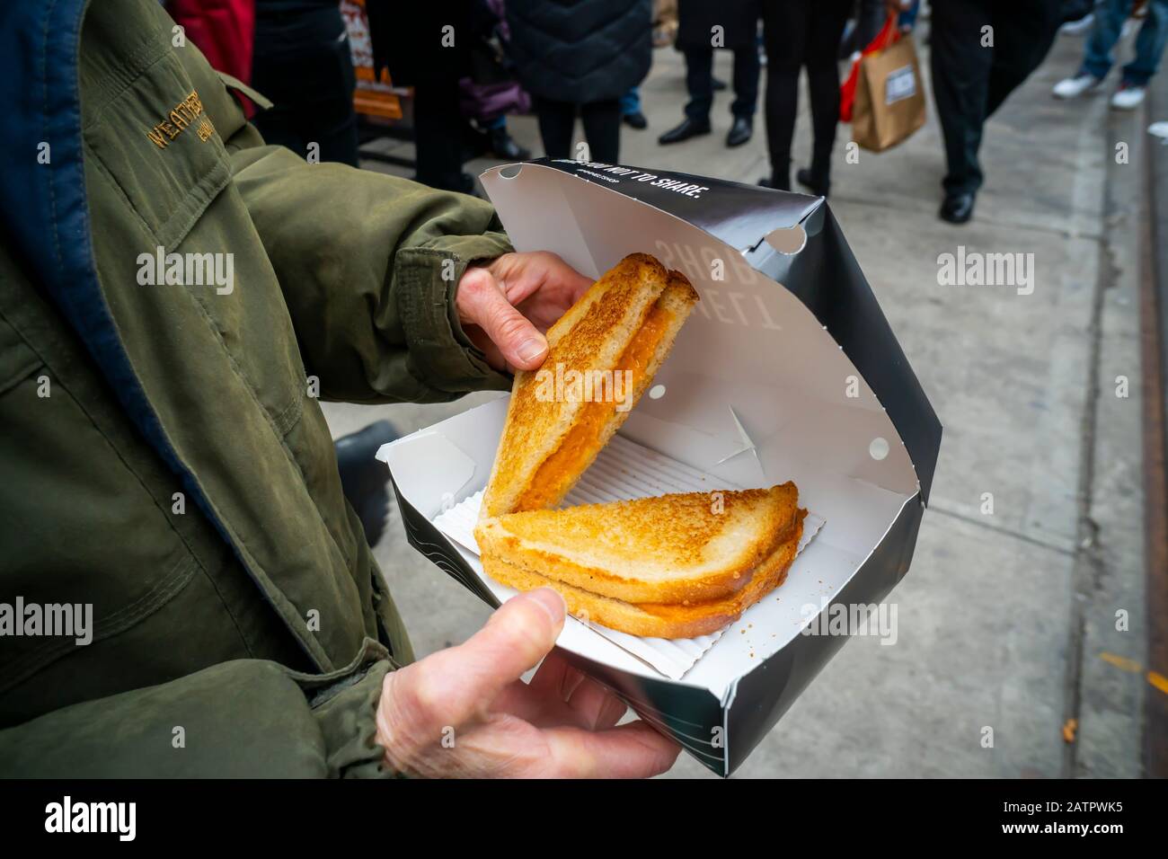 Foodies line up at the Melt Shop in Union Square in New York for a ...