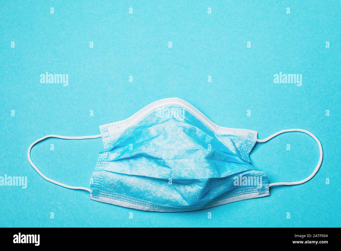 Blue disposable medical mask hi-res stock photography and images - Alamy