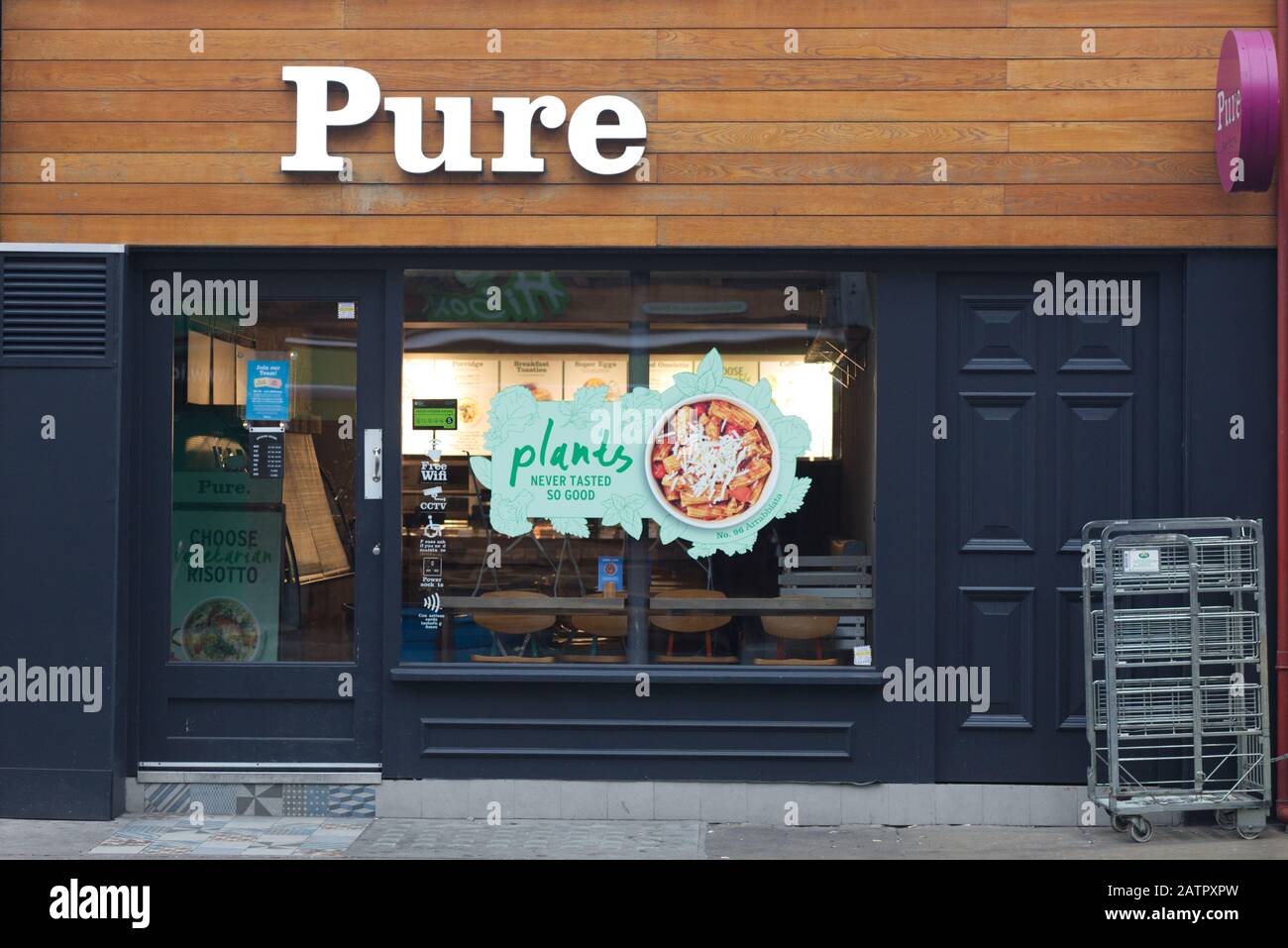 Pure, Plants never tasted better, cafe Stock Photo - Alamy