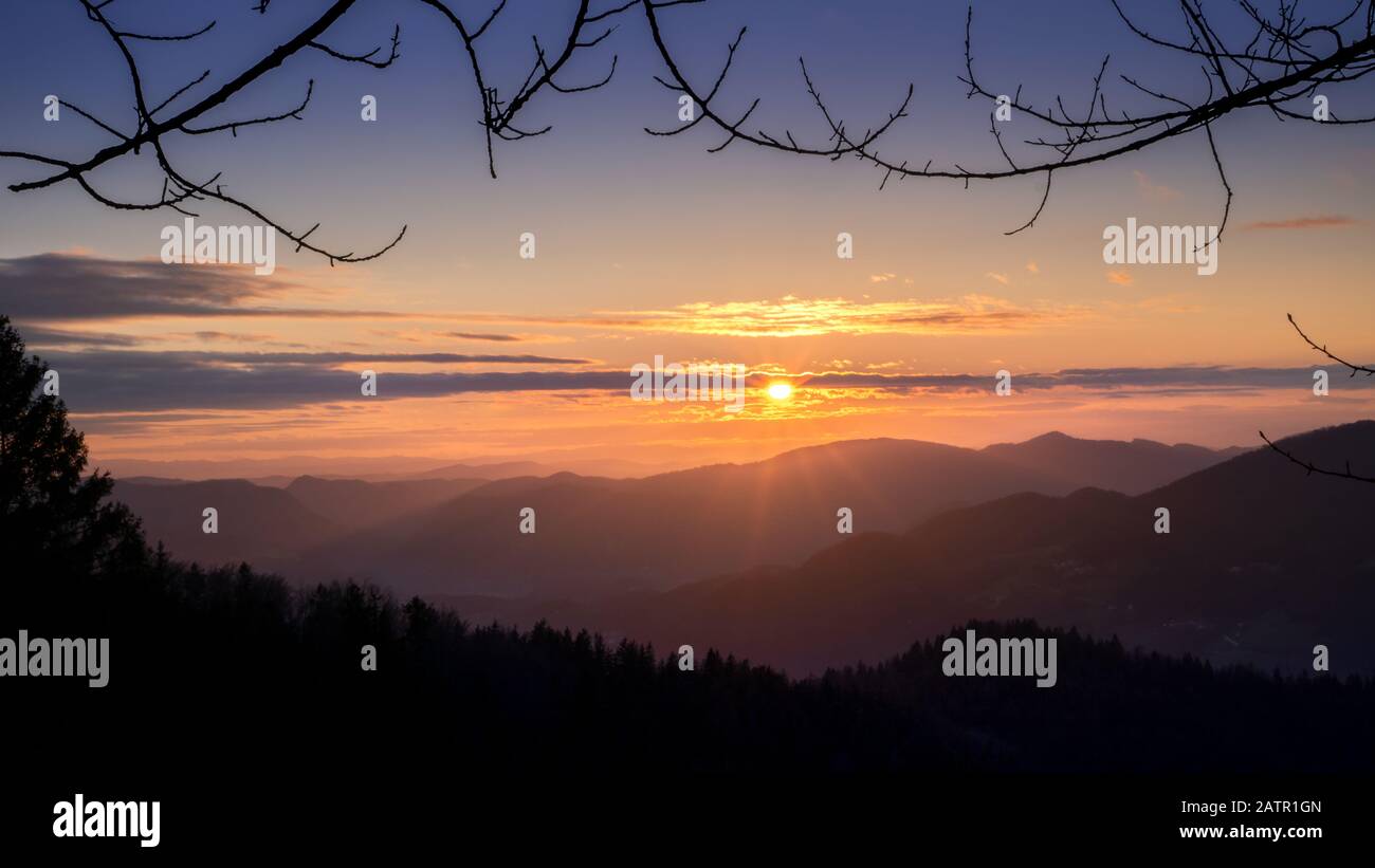 Orange yellow golden sunlight over hills hi-res stock photography and ...