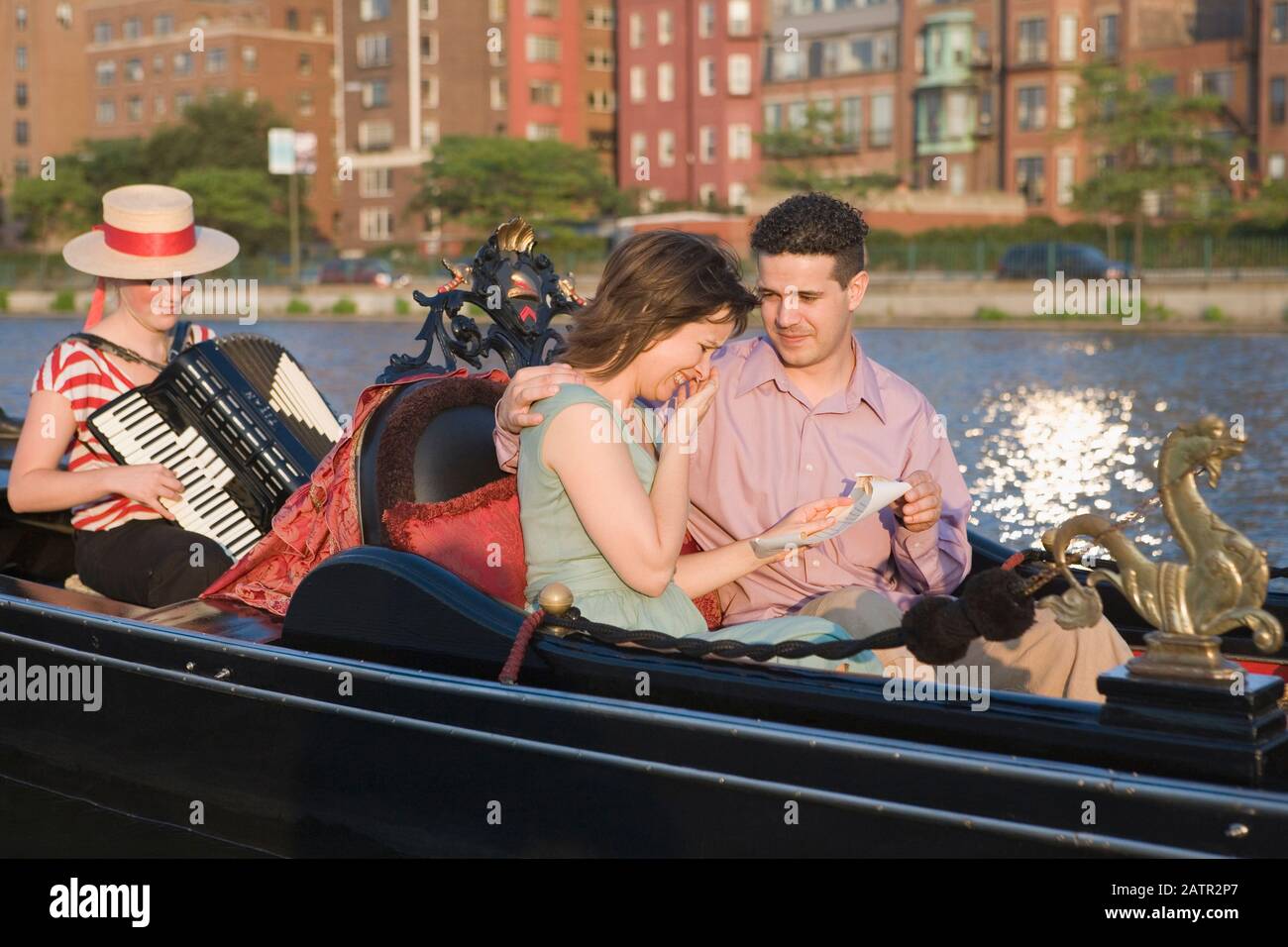 Mid adult couple romancing in a gondola Stock Photo - Alamy