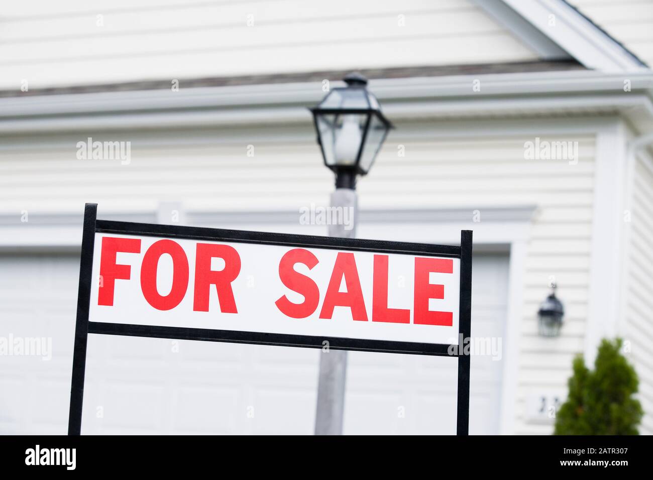 For Sale signboard in front of a house Stock Photo - Alamy