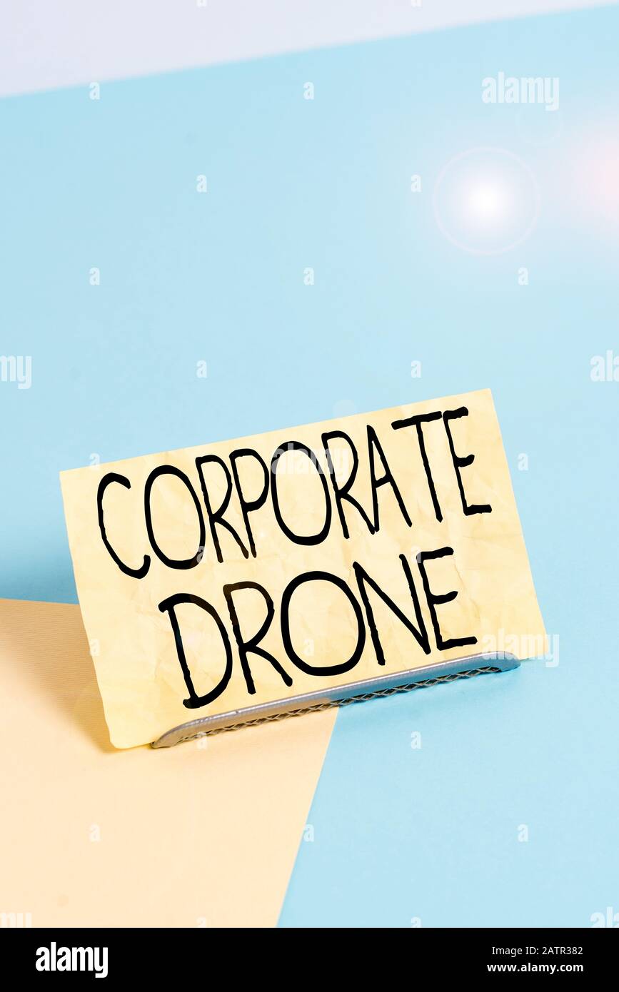 Conceptual hand writing showing Corporate Drone. Concept meaning ...