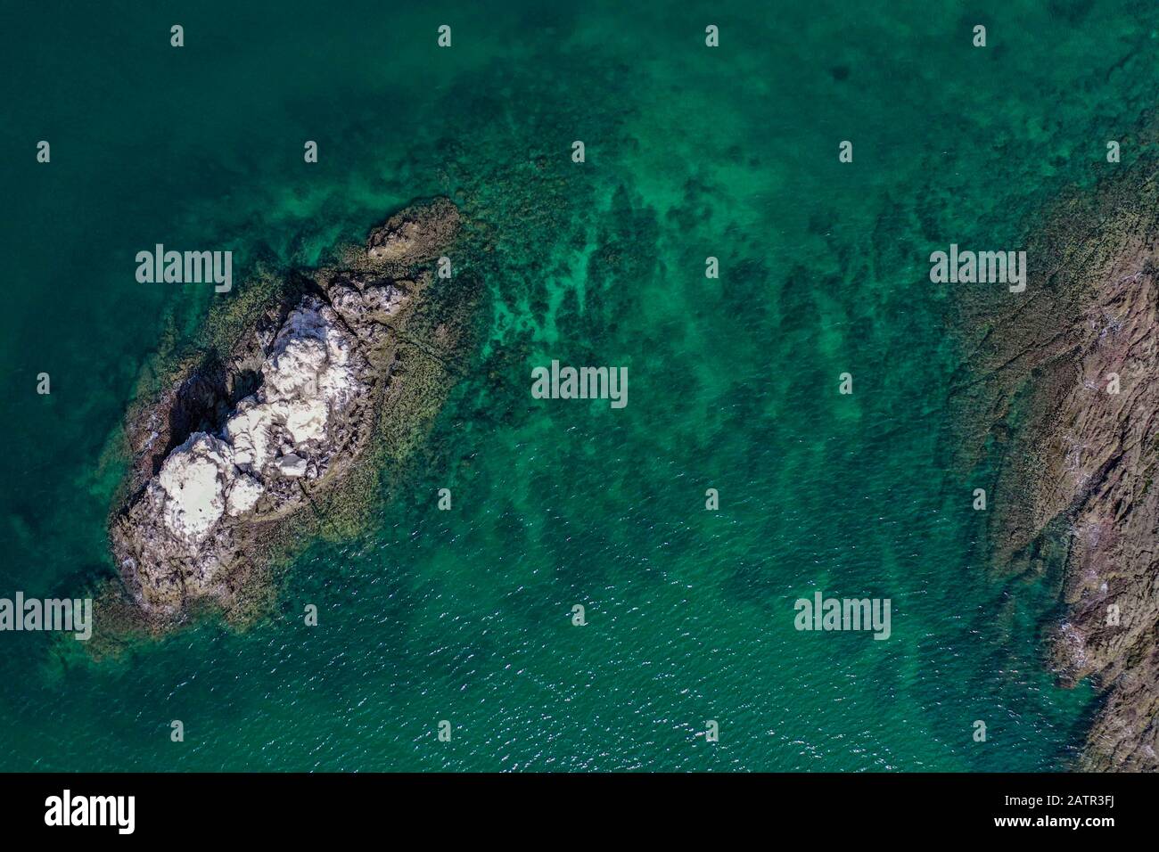 Islets, island in Choyudo beach. stable land area full of guano. Islet ...