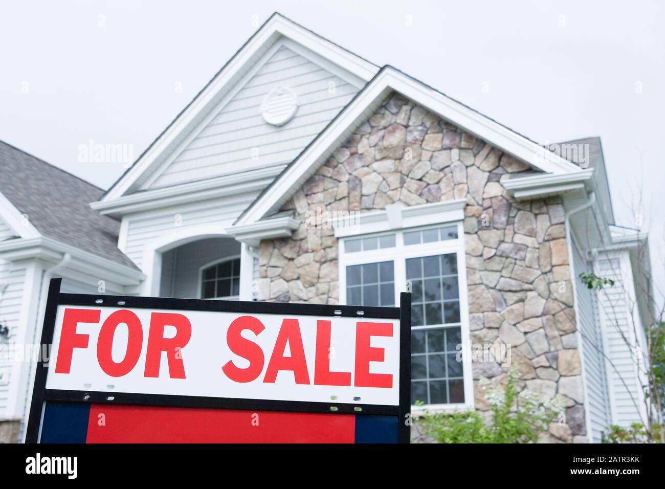 For Sale signboard in front of a house Stock Photo - Alamy