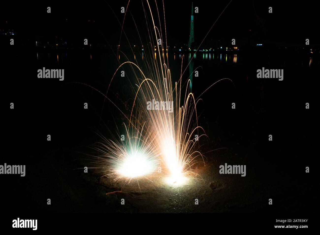 Playing with New Year firecrackers at night, dark background - 1/1/2020 ...