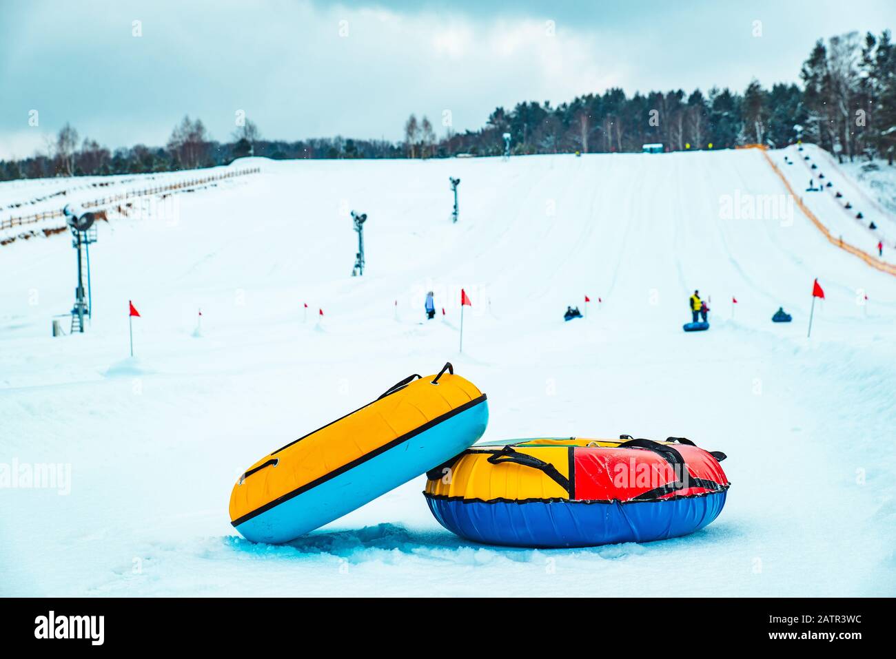 snow tubing rings close up. hill on background Stock Photo - Alamy
