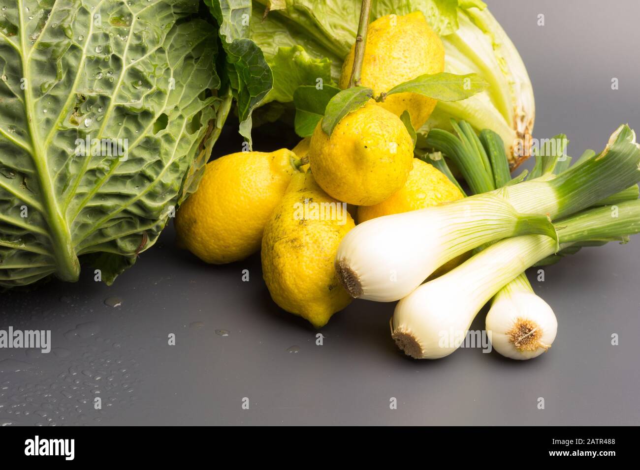Vegetables, cabbage, scallions, lemons, still life of organic ...