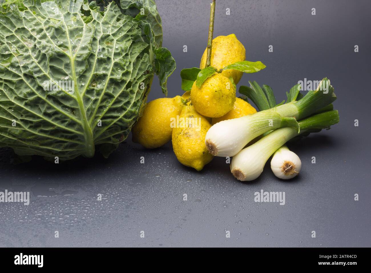 Vegetables, cabbage, scallions, lemons, still life of organic ...