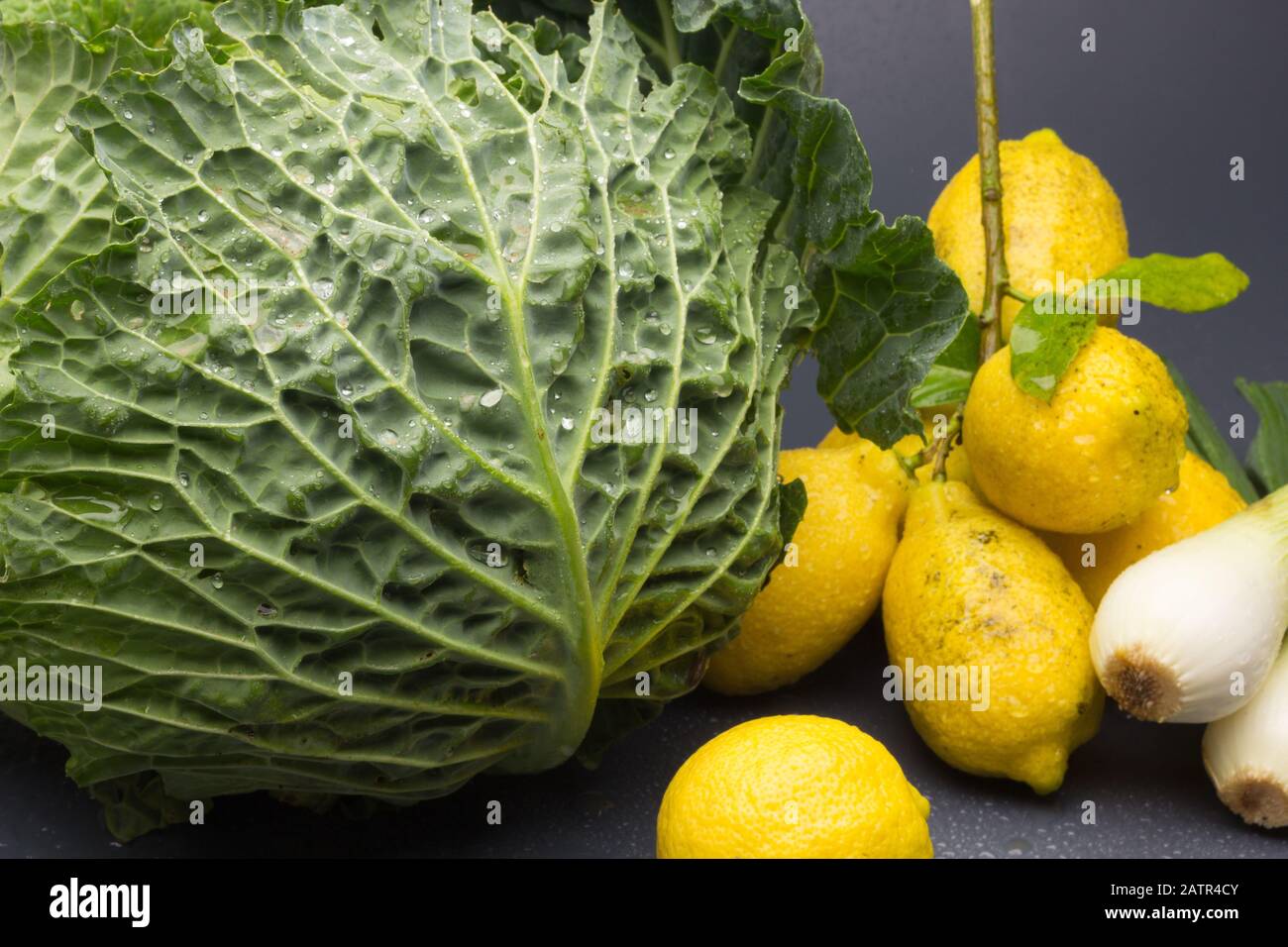 Vegetables, cabbage, scallions, lemons, still life of organic ...