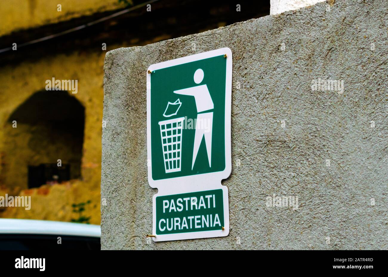A green sign on a wall in Romania that says ''Keep clean'' - Ecologic ...