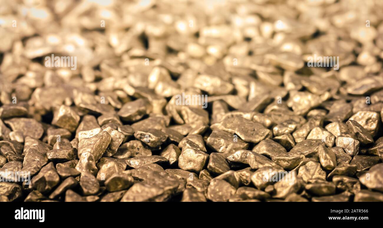 Pile of Gold Nuggets shining. Texture and Pattern Stock Photo - Alamy