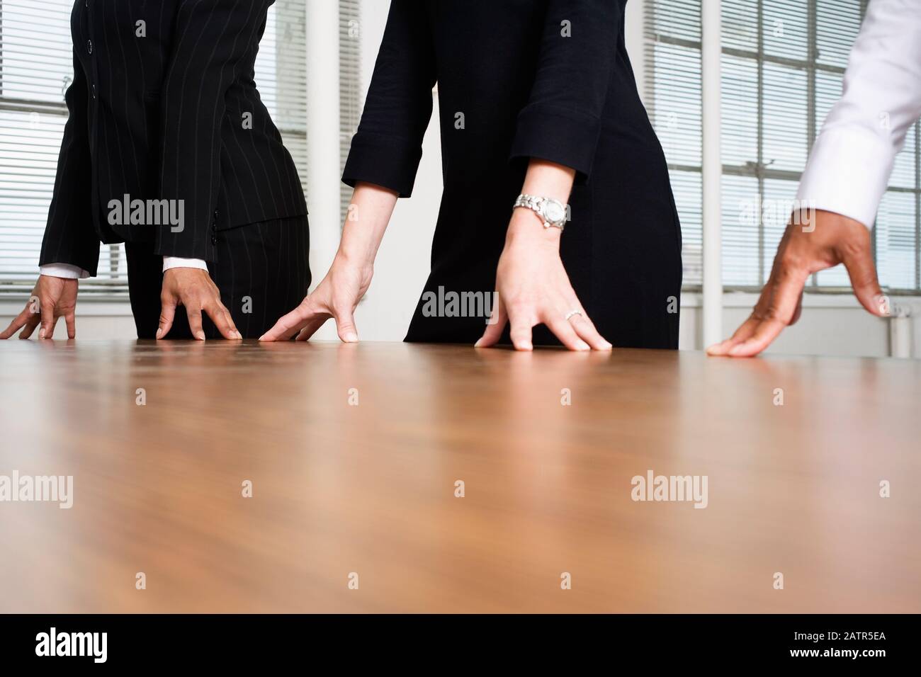 Two men around a meeting room table hi-res stock photography and images ...