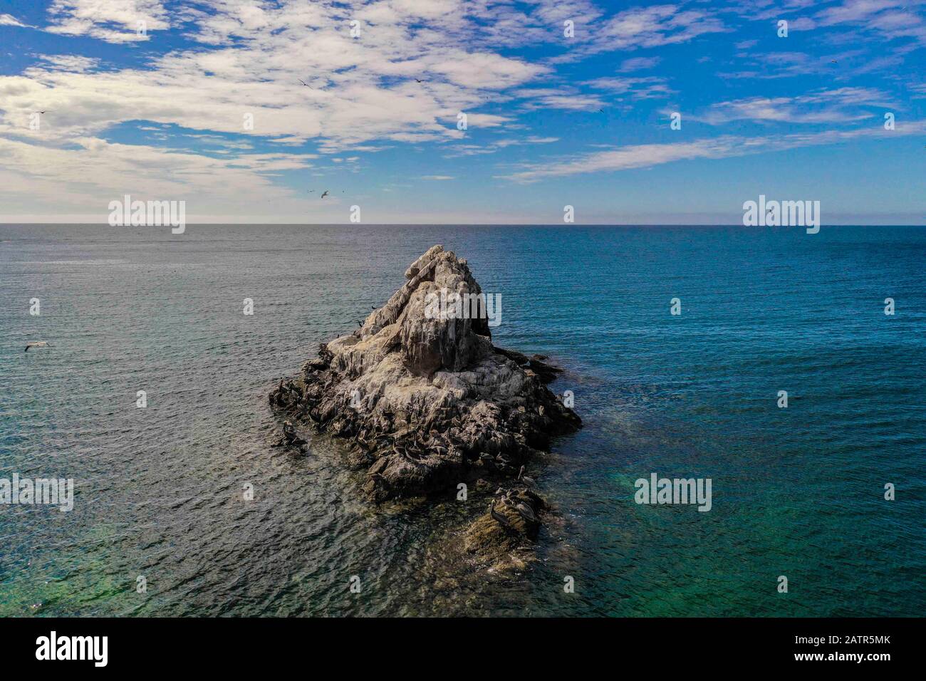 Islets, island in Choyudo beach. stable land area full of guano. Islet ...