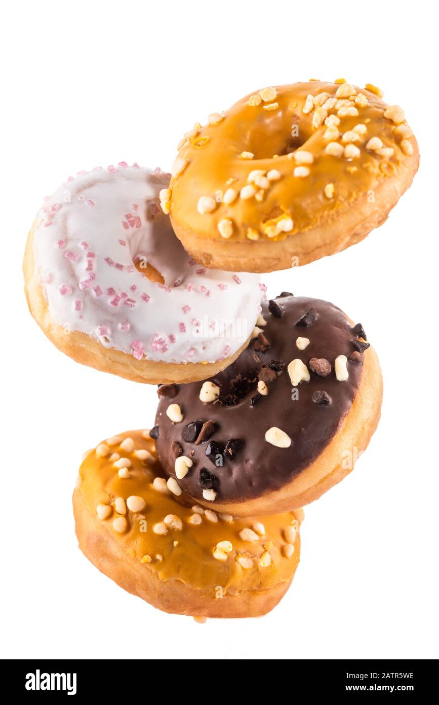 Flying Donut or Doughnut Creative Image. Falling Food On White ...