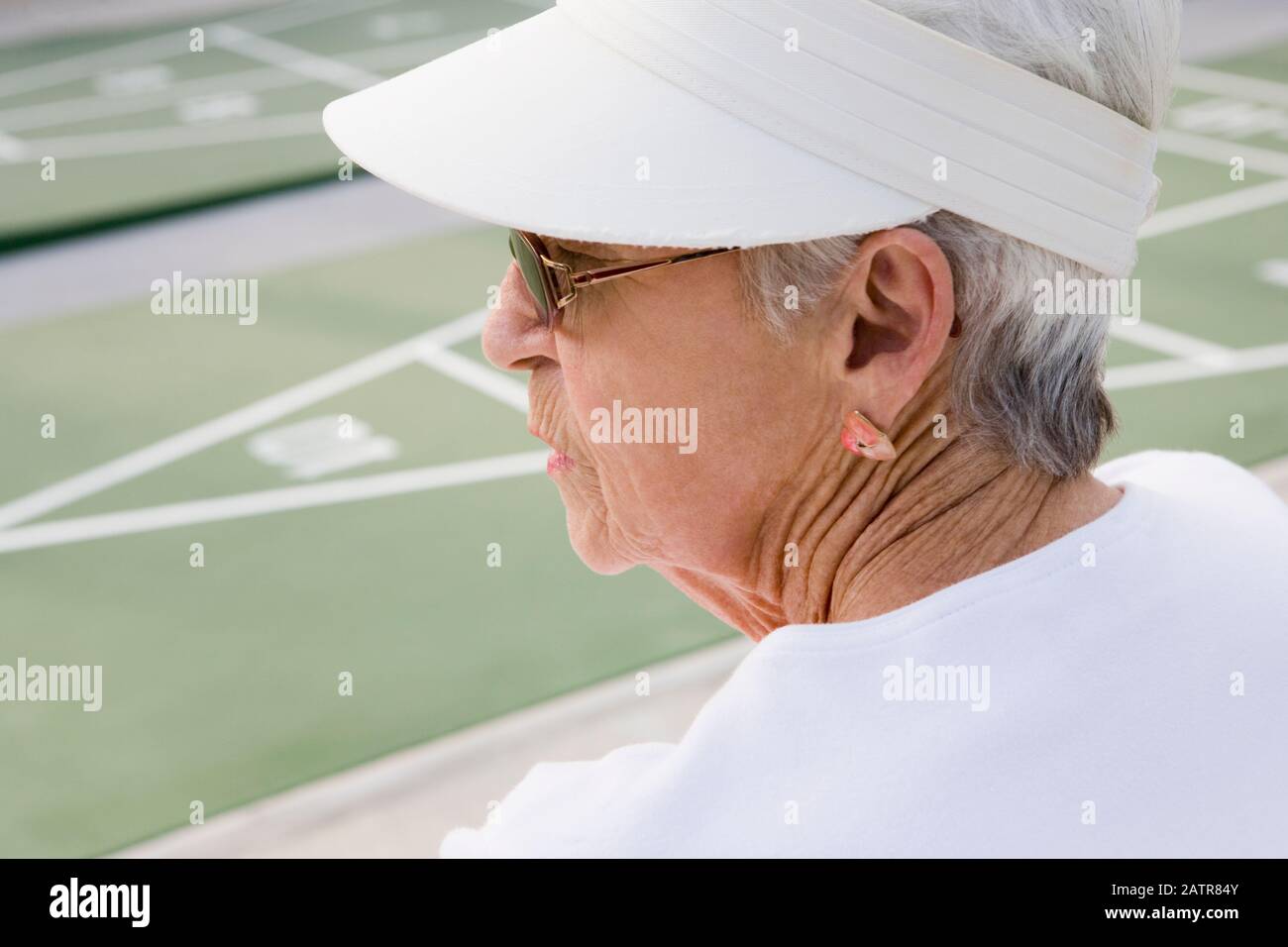Rear view of a senior woman Stock Photo - Alamy
