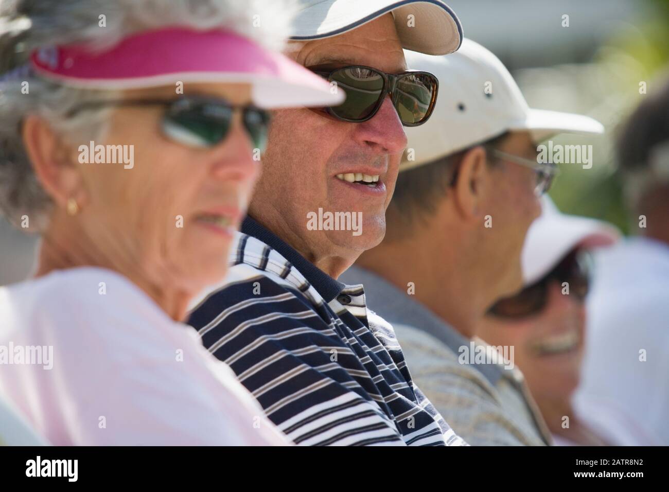 Group of people in a row Stock Photo - Alamy