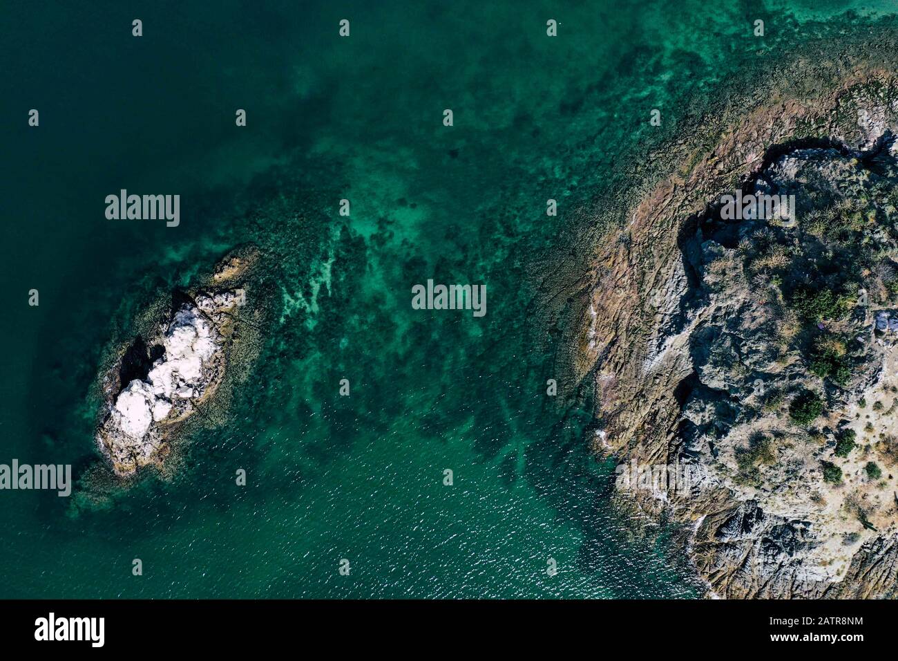 Islets, island in Choyudo beach. stable land area full of guano. Islet ...