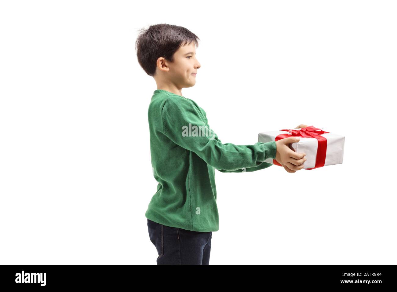 Boy giving a wrapped present box isolated on white background Stock ...