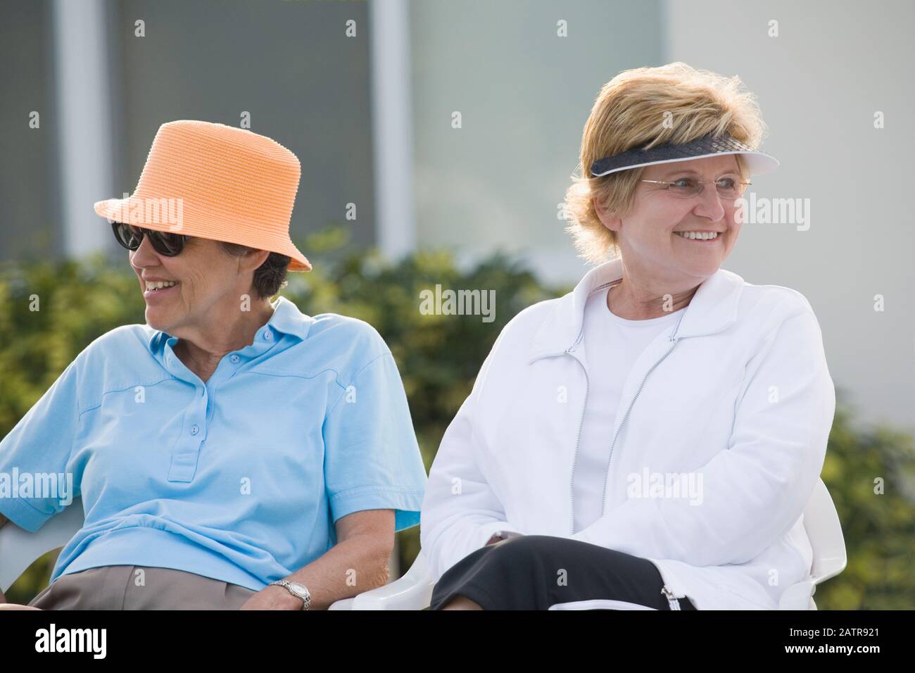Two senior women sitting together Stock Photo - Alamy