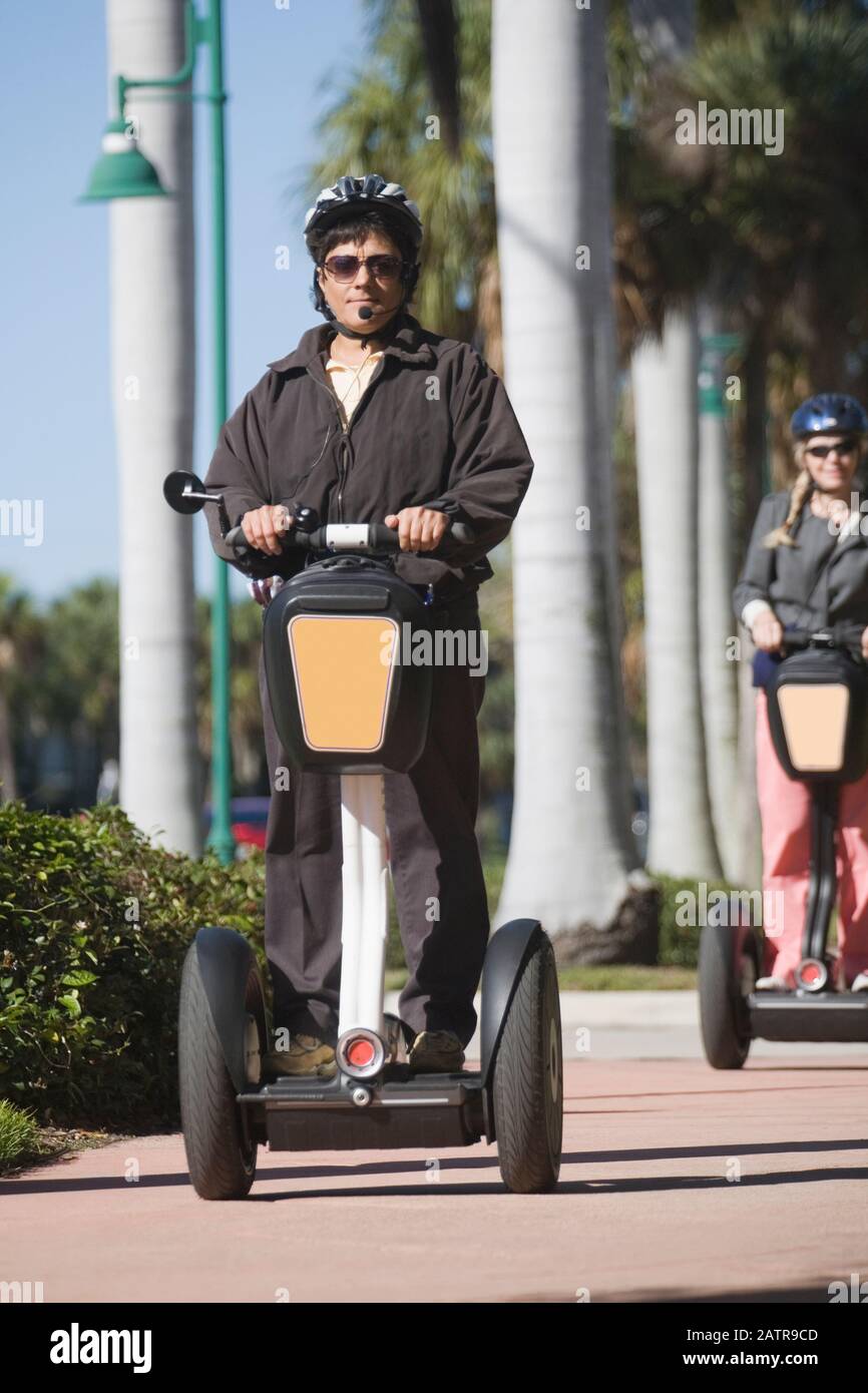 Riding a segway hi-res stock photography and images - Alamy