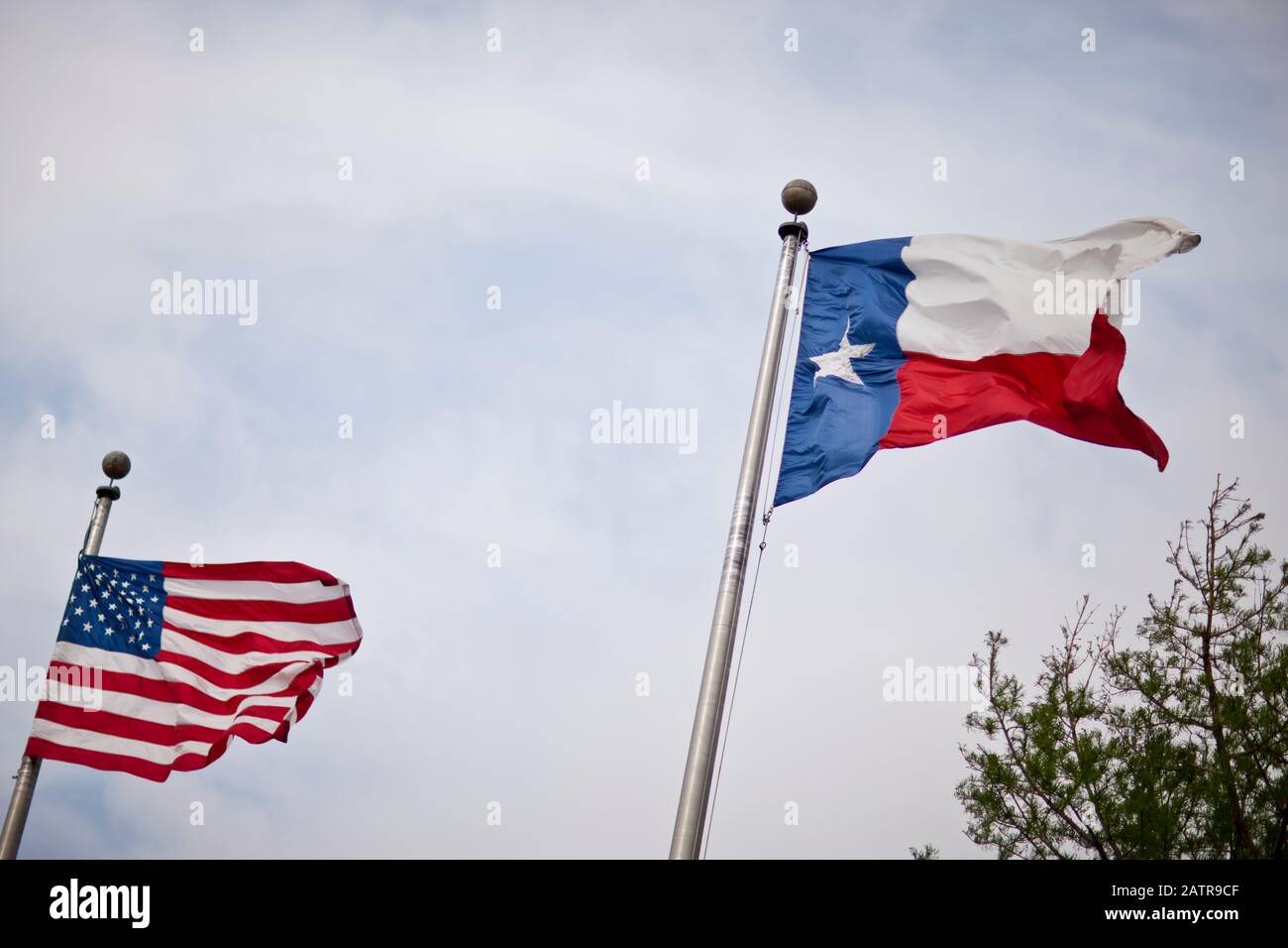 Flying usa and texas flags hi-res stock photography and images - Alamy