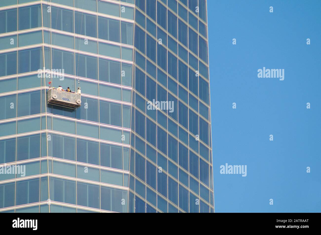 Cleaning the glass facade. Cristal Tower, Cuatro Torres Business Area ...