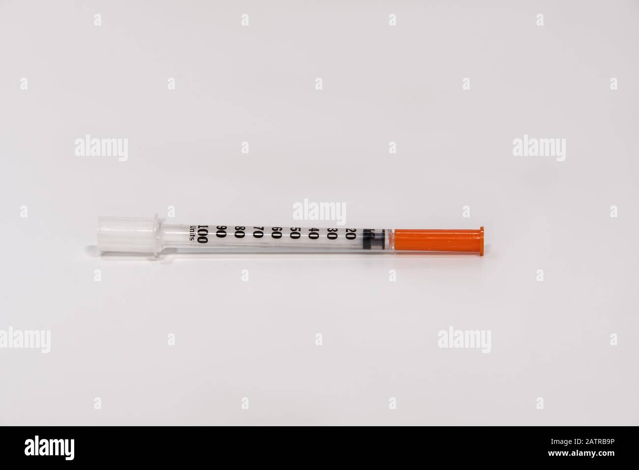 Disposable plastic insulin syringe with a metallic nozzle ...