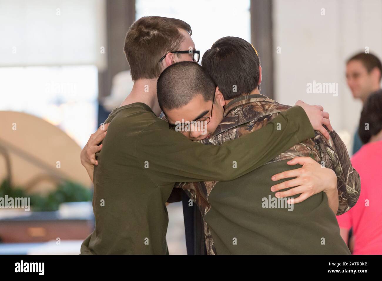 Grief mourning hugging hi-res stock photography and images - Alamy
