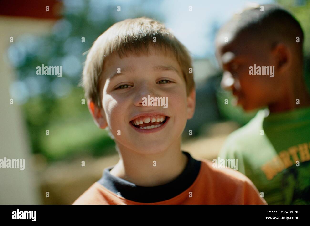 Young boy with a big smile Stock Photo - Alamy