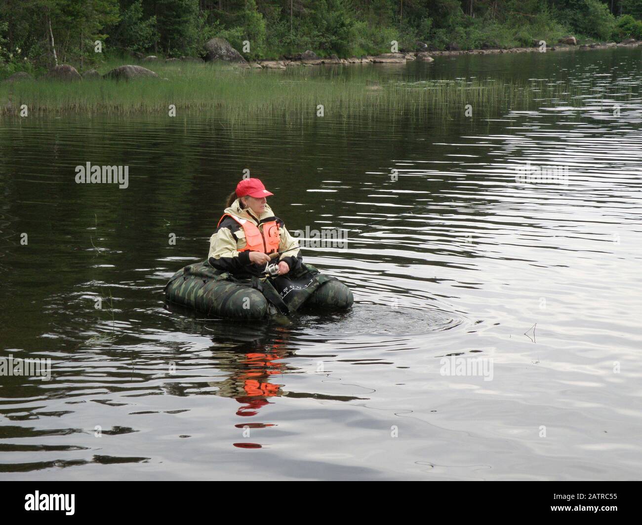 Spinning fishing with floating ring Stock Photo - Alamy