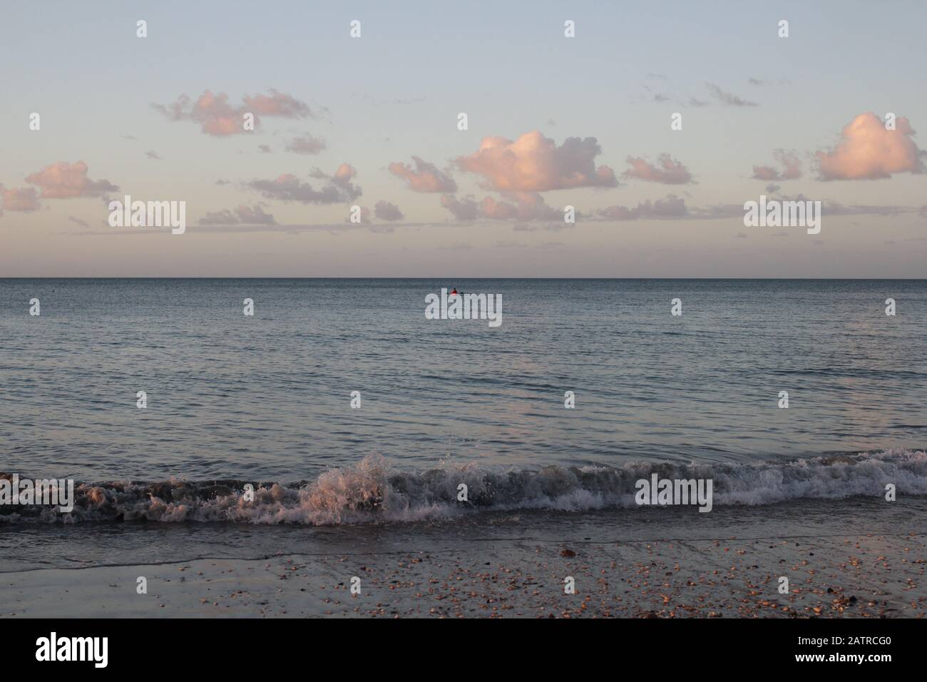 Tidal waves sunset in slow hi-res stock photography and images - Alamy
