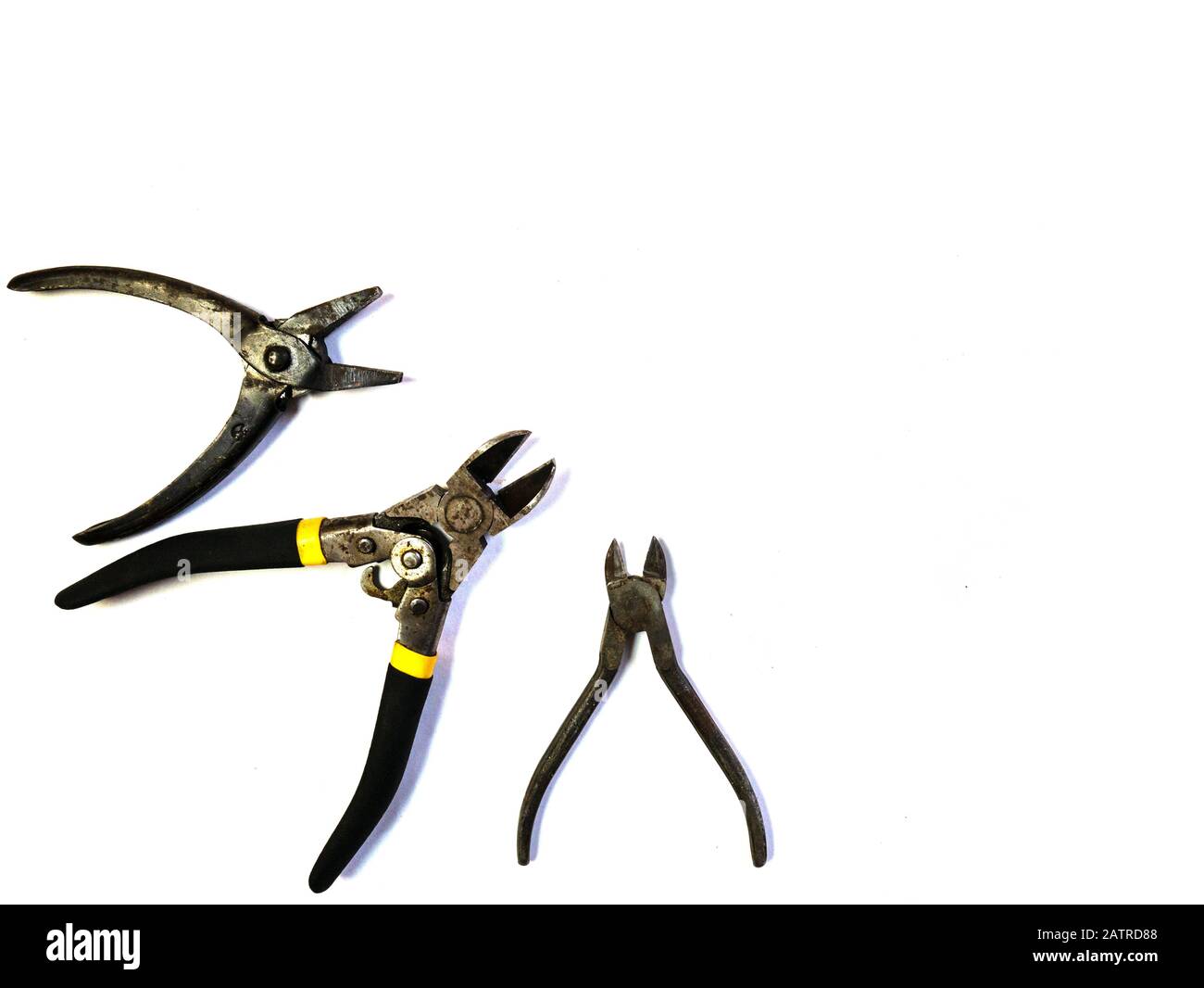Pliers and cutters on a white background Stock Photo - Alamy