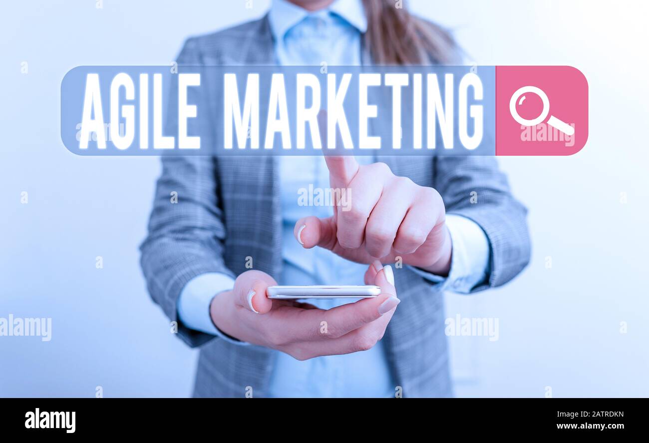 Writing note showing Agile Marketing. Business concept for focusing ...