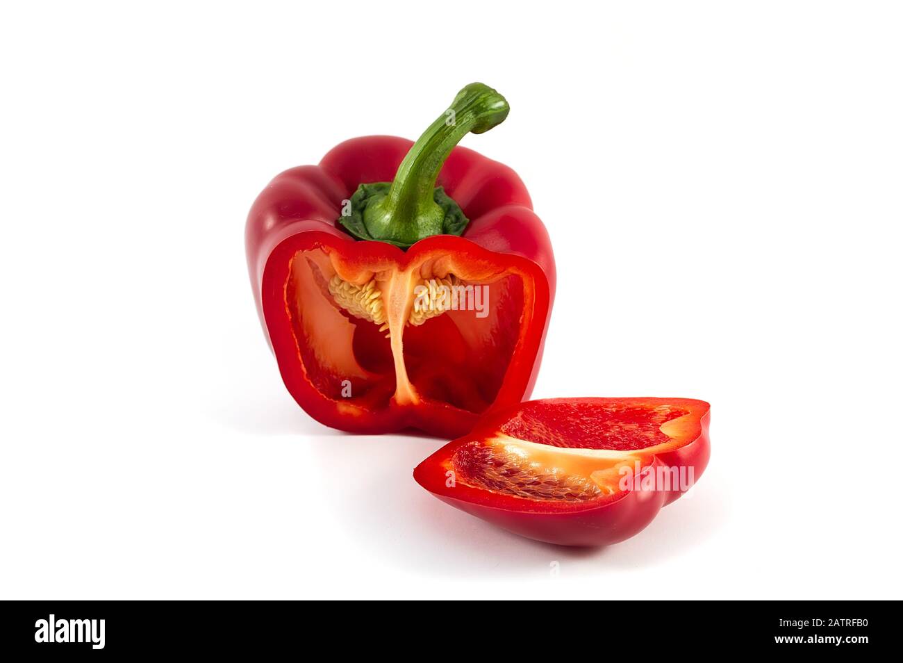Red bell pepper cuted in half, with the core and seeds, large top view ...