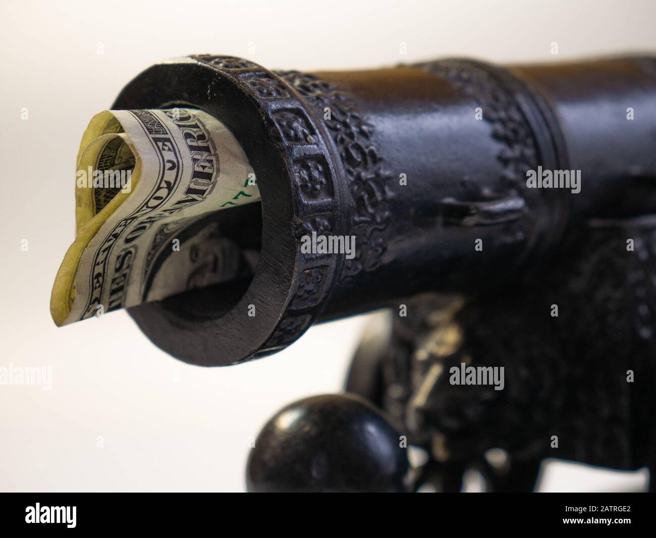 Shot with money. Empty waste of money Stock Photo - Alamy