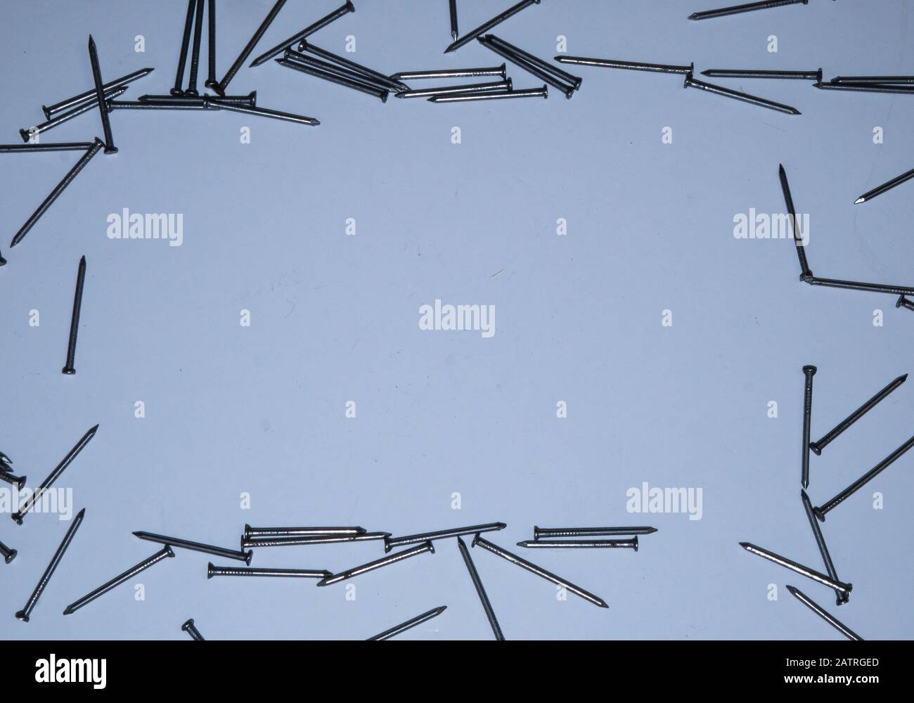 Flat lay nails on a white background. Copy space Stock Photo - Alamy