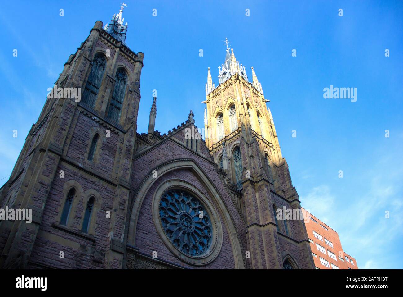 A church in shadow and sunlight Stock Photo - Alamy
