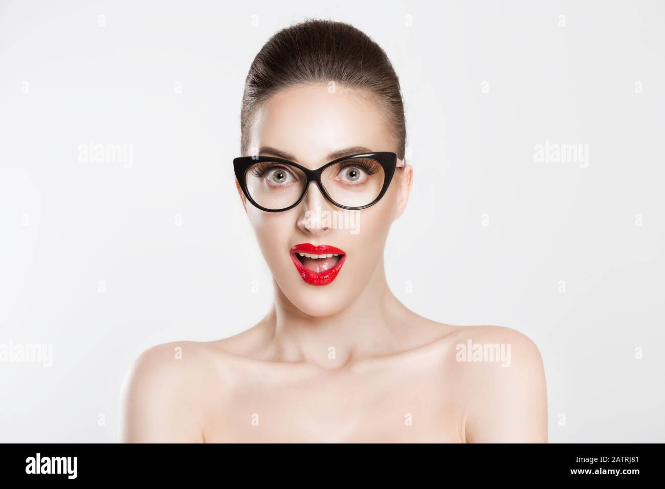 Wow. Shocked surprised stunned. Close up portrait young woman beautiful ...