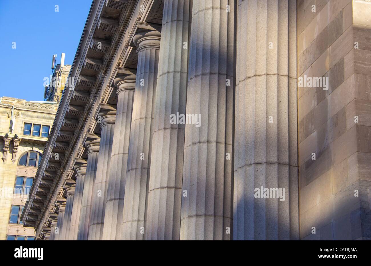 Columns at courthouse entrance Stock Photo - Alamy