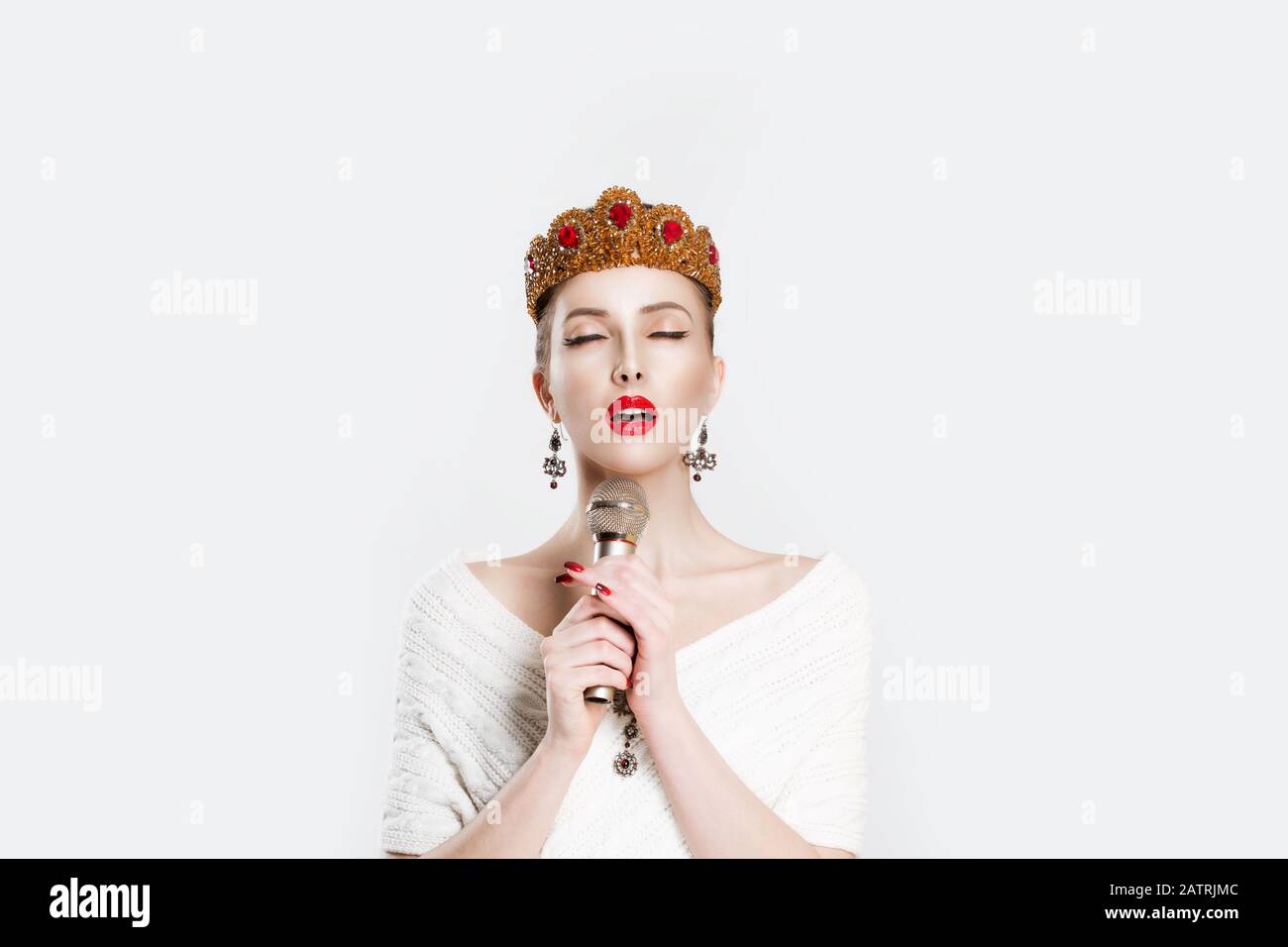 Retro singer. Beauty queen speaking singing karaoke on microphone ...