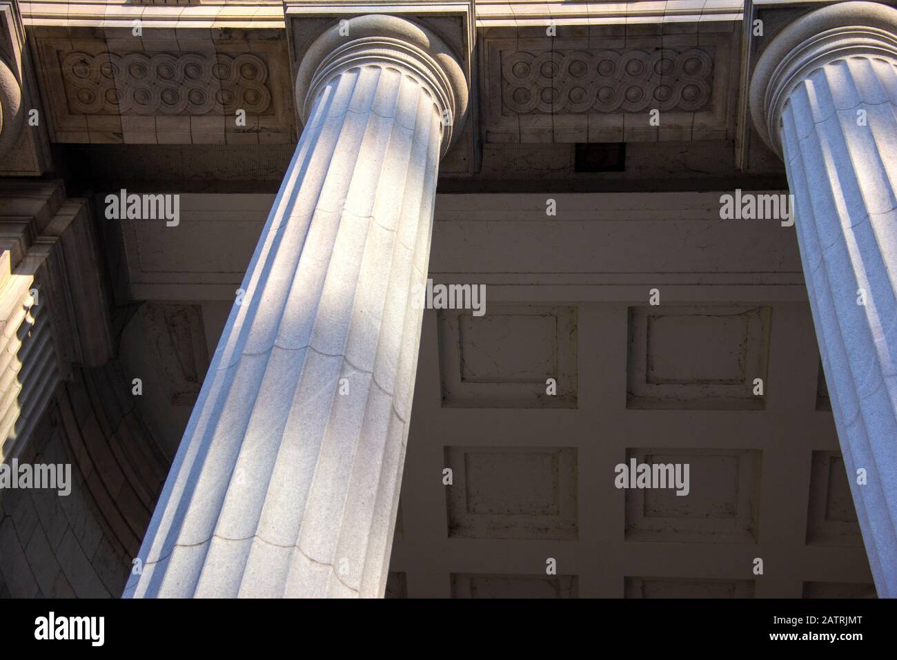 Columns at courthouse entrance Stock Photo - Alamy