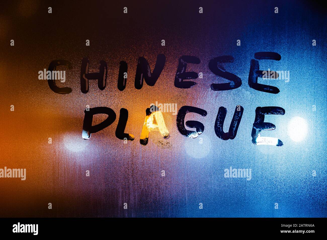 The words chinese plague handwritten on sweat window glass surface at ...