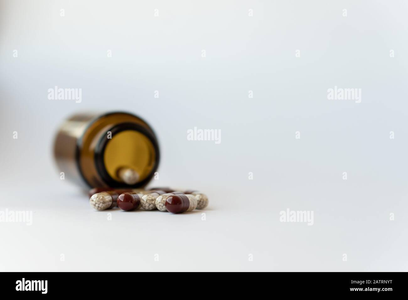 Medicine and pills. Medicines on a white background close-up. Brown ...