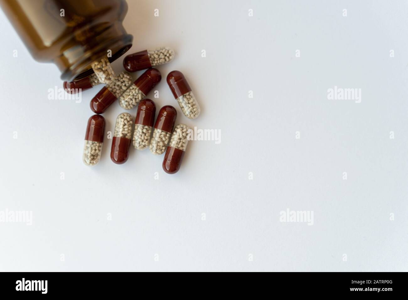 Medicine and pills. Medicines on a white background close-up. Brown ...